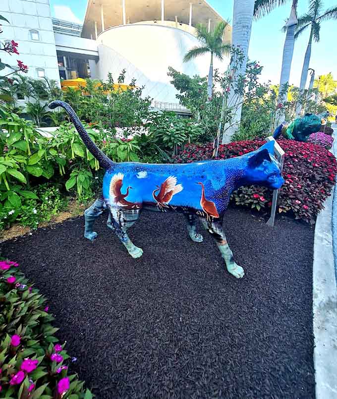 This blue cat looks like it swam straight out of the ocean and decided land life suited it just fine.