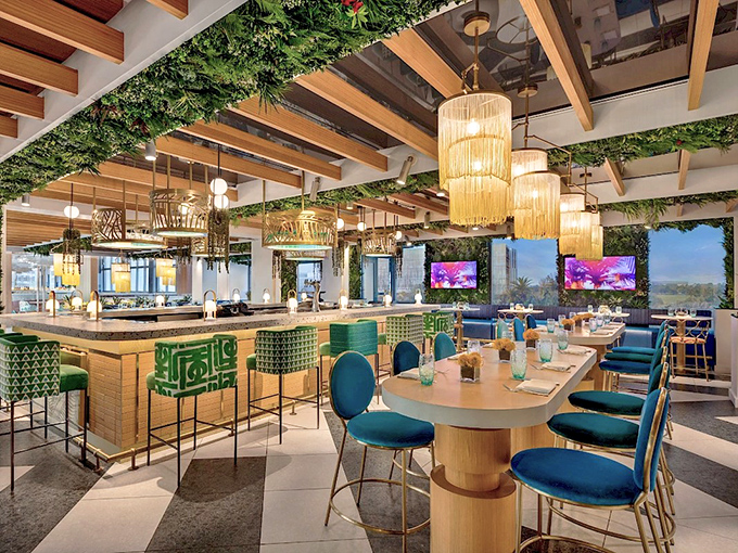 After exploring the garden, Garni Caf&eacute; welcomes art enthusiasts with hanging plants and contemporary design that complement the outdoor experience.