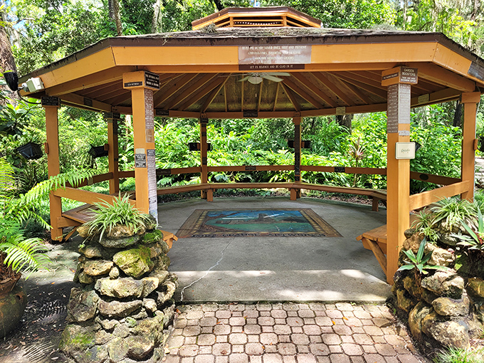 This contemplative gazebo invites visitors to pause and reflect. Is it pondering the garden's beauty, or wondering why someone put dinosaurs next to sugar mill ruins?