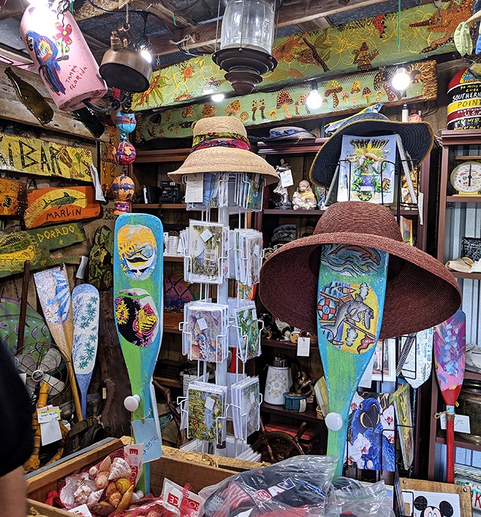 Straw hats hang like tropical fruit, ready to protect visitors from the Florida sun or serve as quirky wall d&eacute;cor.