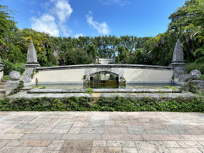 This weathered fountain has witnessed countless prayers and contemplations, its aged stone telling stories that words never could.