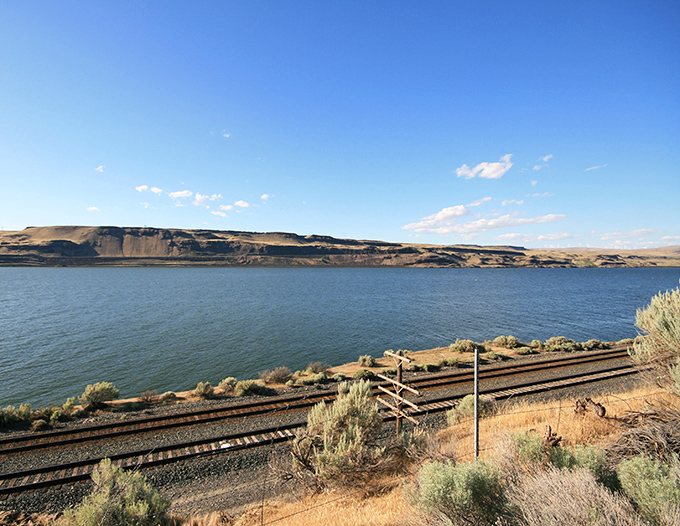 Crystalline waters reflect the surrounding landscape, creating mirror images that double the beauty of Umatilla's natural scenery.