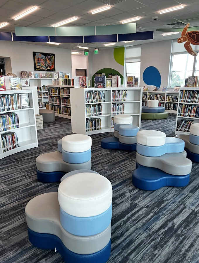 The Monroe County Public Library's modern interior features ocean-inspired seating pods, creating a cool literary oasis in Marathon's tropical heat.