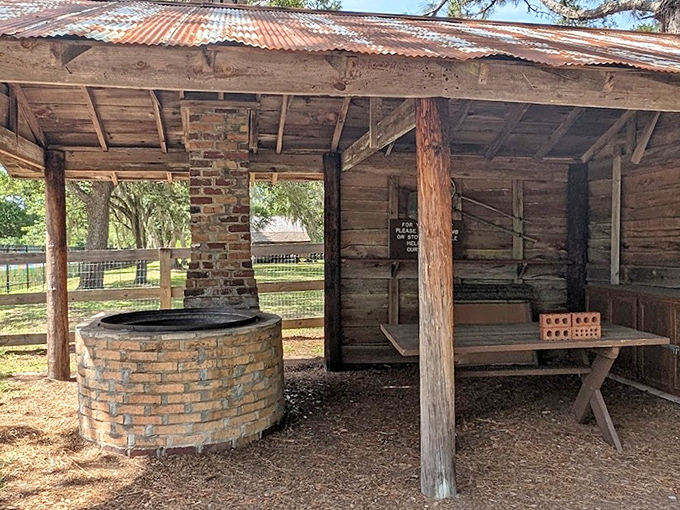 This brick smokehouse once transformed raw meat into preserved provisions, a culinary time capsule from when "food storage" required serious craftsmanship.