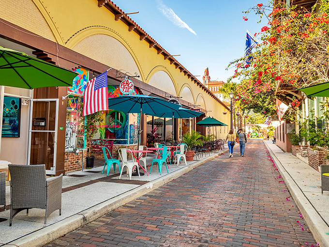 Window boxes overflowing with greenery show how residents maintain the European village aesthetic while adding their own Florida flair.
