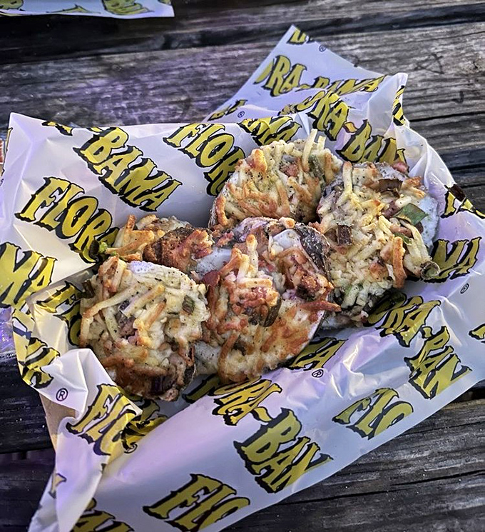 Oysters McClellan &ndash; grilled perfection topped with green onion, bacon and melted smoked gouda that's converted many an oyster skeptic.