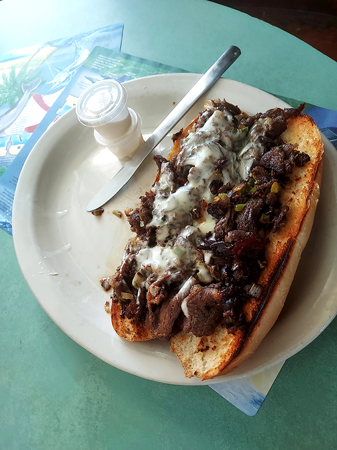 The Philly cheesesteak demands your full attention and both hands &ndash; a beautiful marriage of beef, cheese, and grilled peppers and onions.