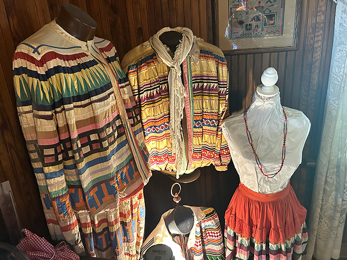 Vibrant Seminole and Miccosukee patchwork clothing displays indigenous artistry that tells stories through geometric patterns and rainbow-bright fabrics.