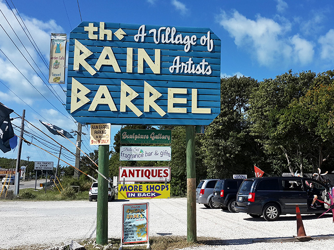 The vintage sign announces your arrival to paradise with all the subtlety of a parrot in a library&mdash;bold, bright, and impossible to ignore.