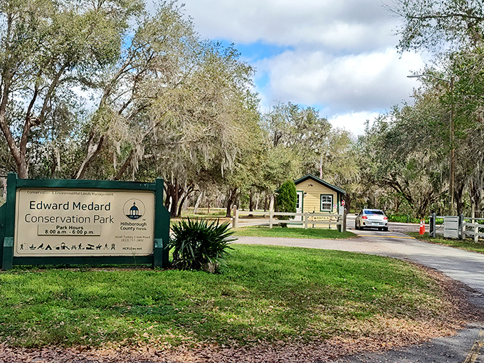 The welcoming entrance sign promises adventures beyond, standing sentinel between everyday life and the natural wonders waiting within.