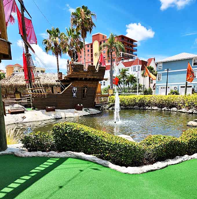 Water dances skyward from this central fountain, creating a cooling mist and hypnotic backdrop for putters navigating the nearby challenging holes.