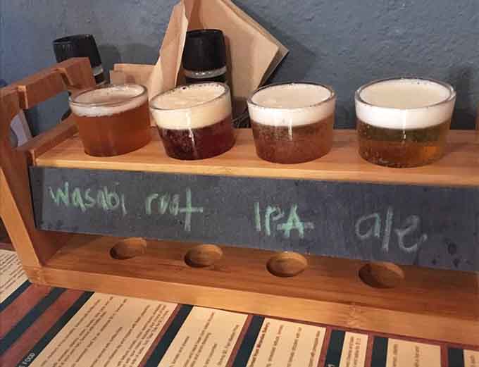 A beer flight lets you sample multiple brews without committing, like speed dating but with better outcomes and fewer awkward conversations.