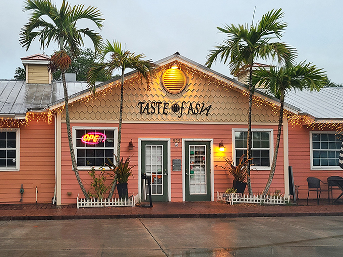 Taste of Asia's coral-colored building glows at dusk, promising exotic flavors that transport diners across continents.