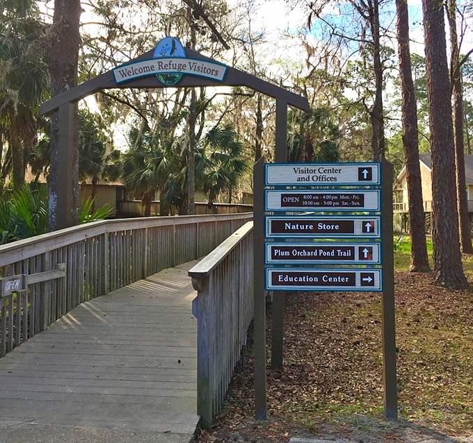 The welcome arch promises adventure while the directional sign offers choices. Choose "all of the above" for best results.