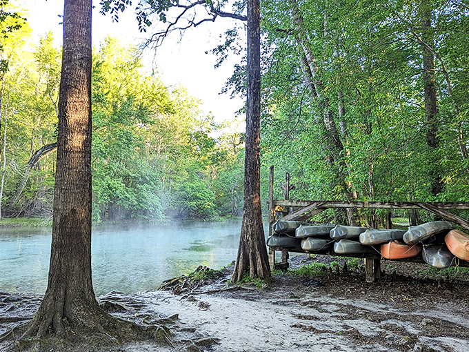 Colorful canoes rest at the ready, like eager puppies waiting for their chance to explore the crystal waters.