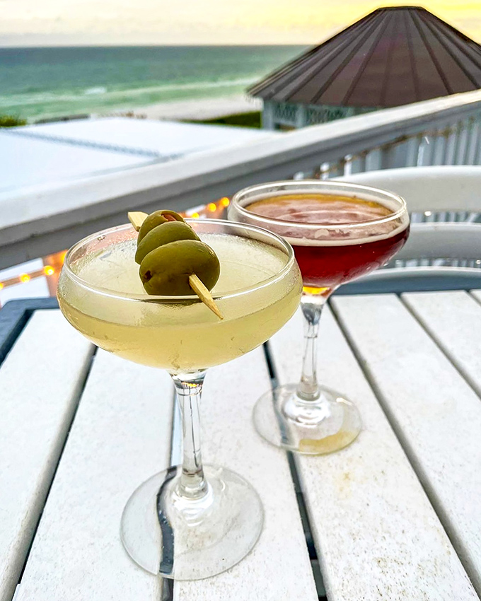 Cocktails: Sunset in a glass &ndash; olive-garnished martinis that perfectly complement the Gulf Coast palette of blues, pinks, and oranges beyond.