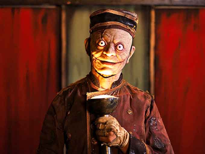 Detailed makeup transforms ordinary faces into extraordinary nightmares. This character's twisted expression is the result of hours of artistic horror craftsmanship.