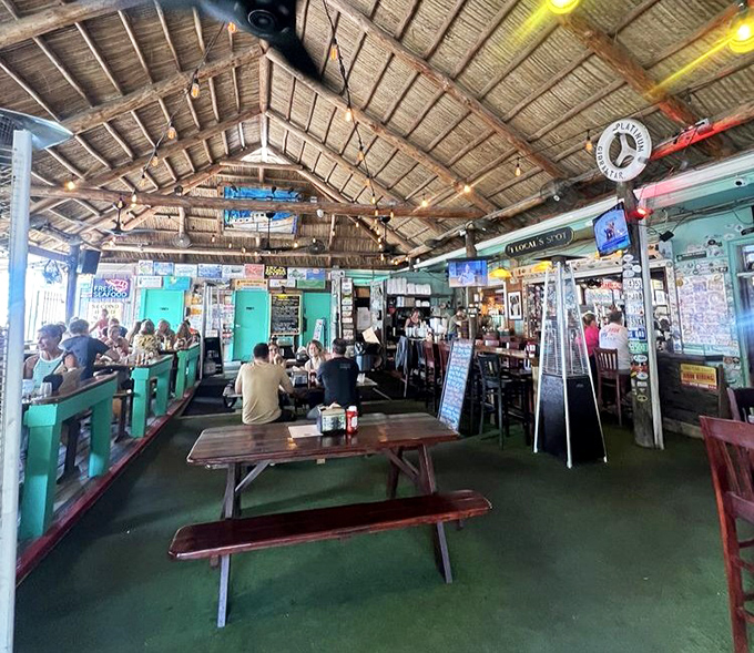 The outdoor deck where strangers become friends over cold drinks and shared appreciation for the simple pleasure of waterfront dining.