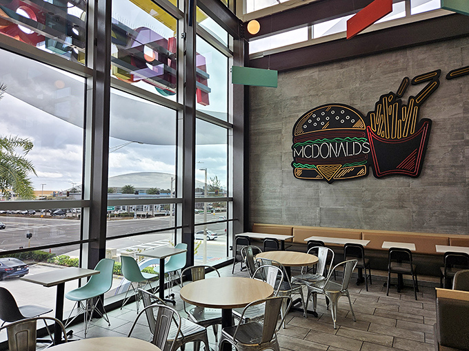 Floor-to-ceiling windows flood the dining area with natural light, creating an airy space that encourages lingering rather than the usual fast-food rush.