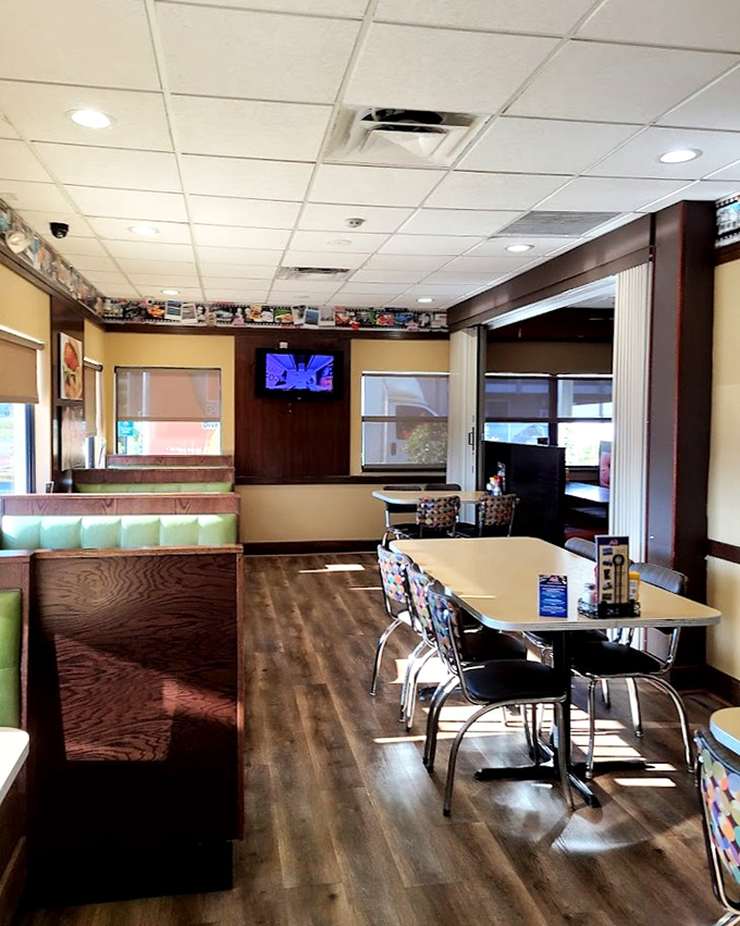 The dining area balances retro charm with modern comfort, where families have been celebrating special occasions and ordinary Tuesdays for generations.