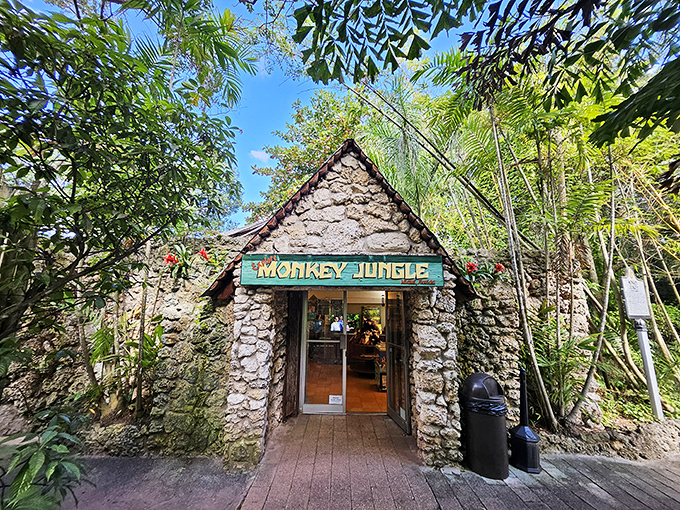 The rustic stone entrance beckons visitors into a world where conventional zoo experiences are turned upside down and inside out.
