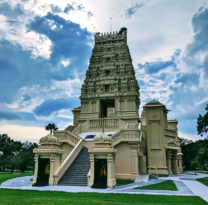 The temple's fa&ccedil;ade presents a symphony in stone, where hundreds of carved figures create a three-dimensional textbook of Hindu mythology and symbolism.