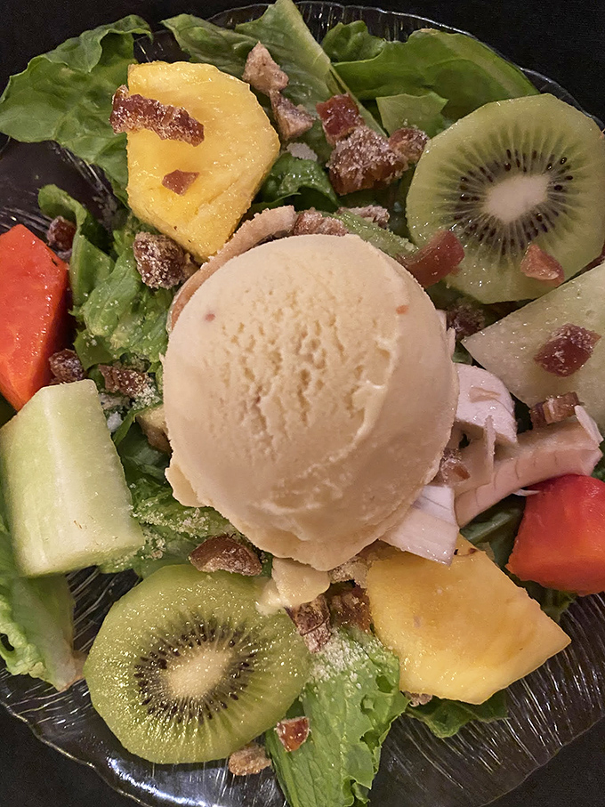 This legendary Florida salad combines hearts of palm, fresh fruits, and that signature scoop of ice cream into a dish worth driving hours for.