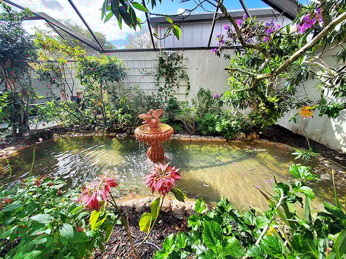 The indoor garden exhibit creates a peaceful sanctuary where butterflies and plants coexist in perfect, designed harmony.