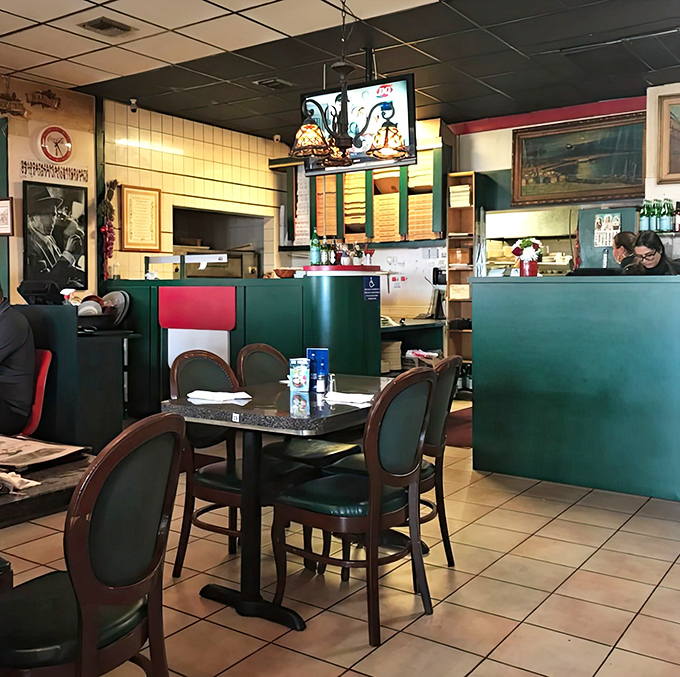Where the magic happens &ndash; the kitchen and counter area showcase the restaurant's blend of efficiency and old-world charm.