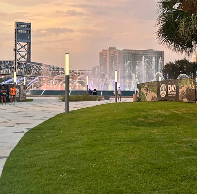 Sunset transforms Jacksonville's riverfront into a painter's palette of oranges and purples, while the fountain adds its own splash of drama.