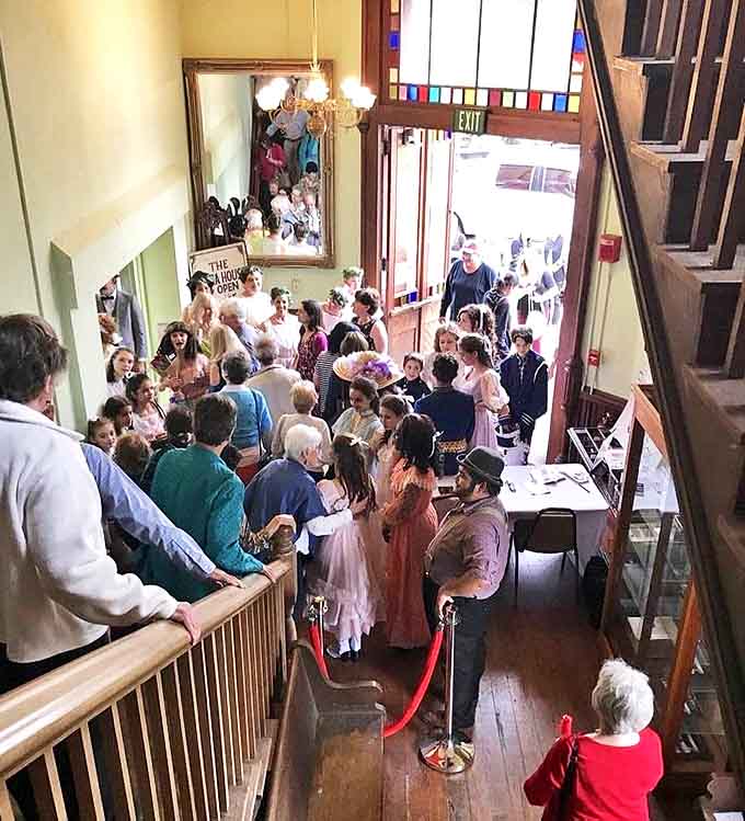 The lobby fills with excited theatergoers, that magical moment before the house lights dim and everyday life transforms into theatrical adventure.