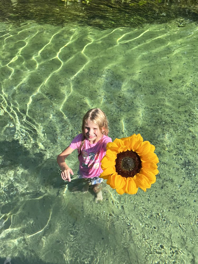 Pure joy, captured! The sparkling, shallow water is the perfect temperature for splashing, especially when you bring your own sunshine.