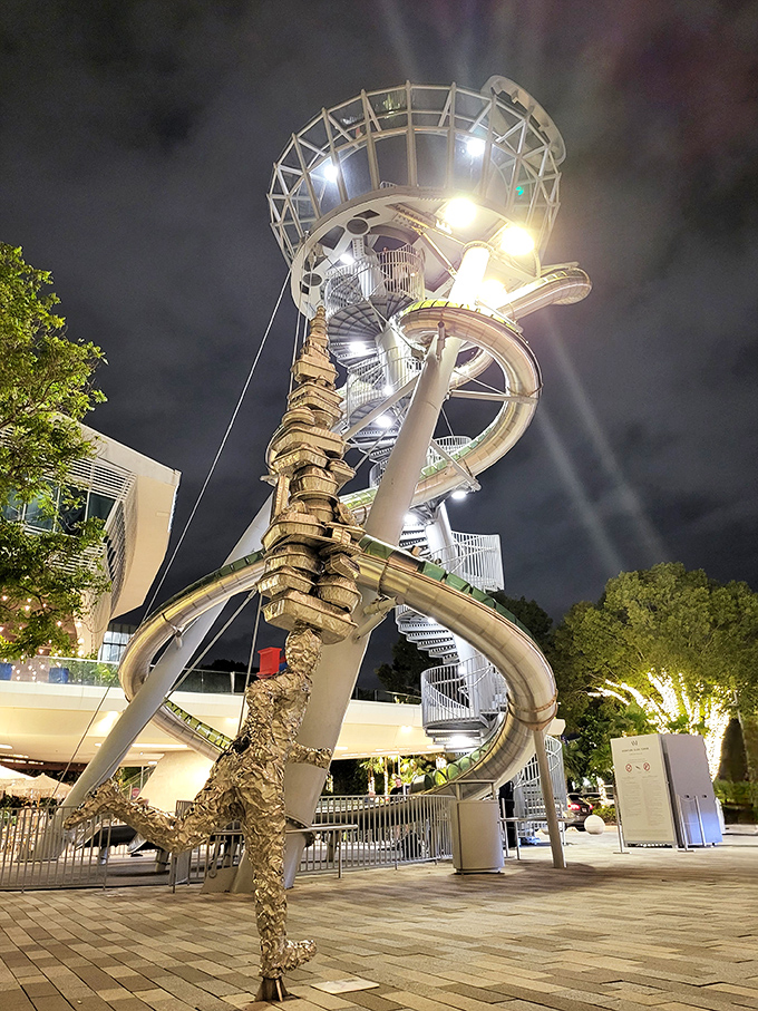 Sculptural elements surround the tower, creating an artistic playground where the line between installation and attraction beautifully blurs.