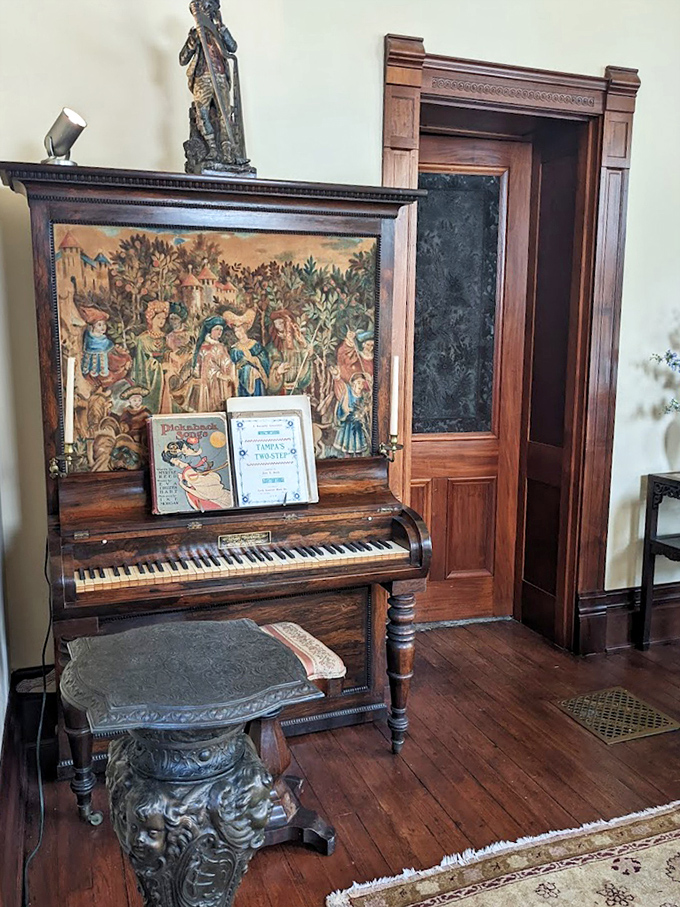 The antique piano in the music room sits ready for ghostly fingers to play ragtime tunes, sheet music waiting as it has for over a century.