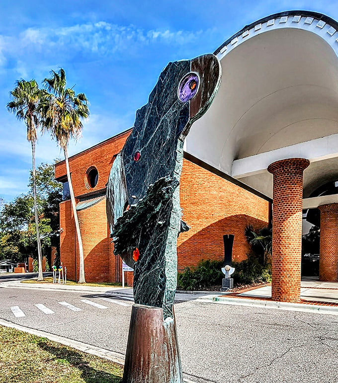 The Polk Museum's classic entrance columns frame the pathway to artistic discovery in the heart of Lakeland.