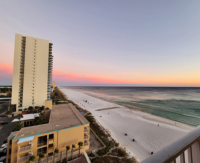 The stunning sunset paints Panama City Beach's skyline in warm hues, as the day ends perfectly along this beloved stretch of Florida's Gulf Coast.