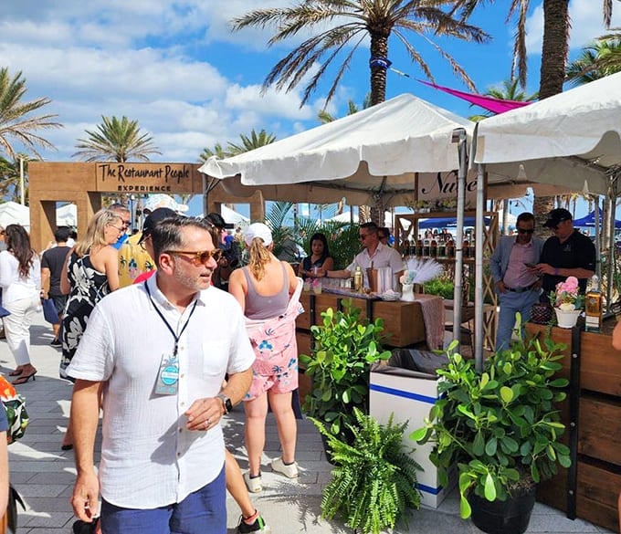 Sophisticated vendor booths nestled among tropical landscaping offer gourmet tastings that blend Fort Lauderdale's style with incredible flavors.
