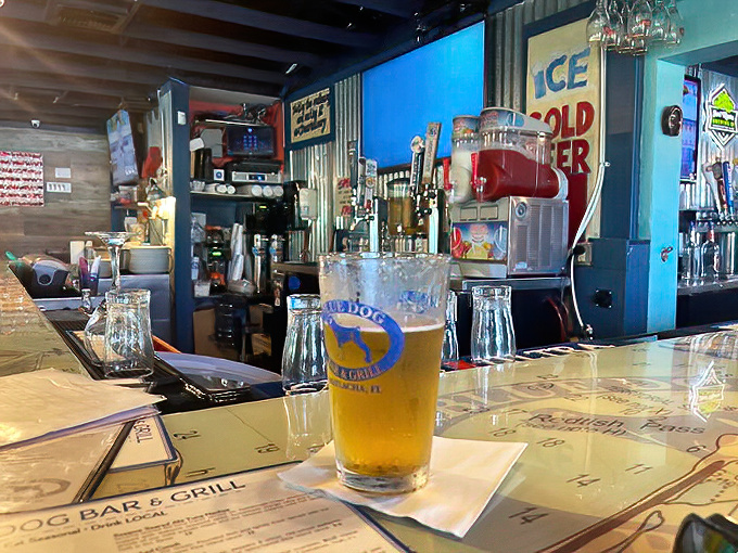 Bright colors and a chilled draft beer set the perfect tone for a relaxed coastal bar visit.