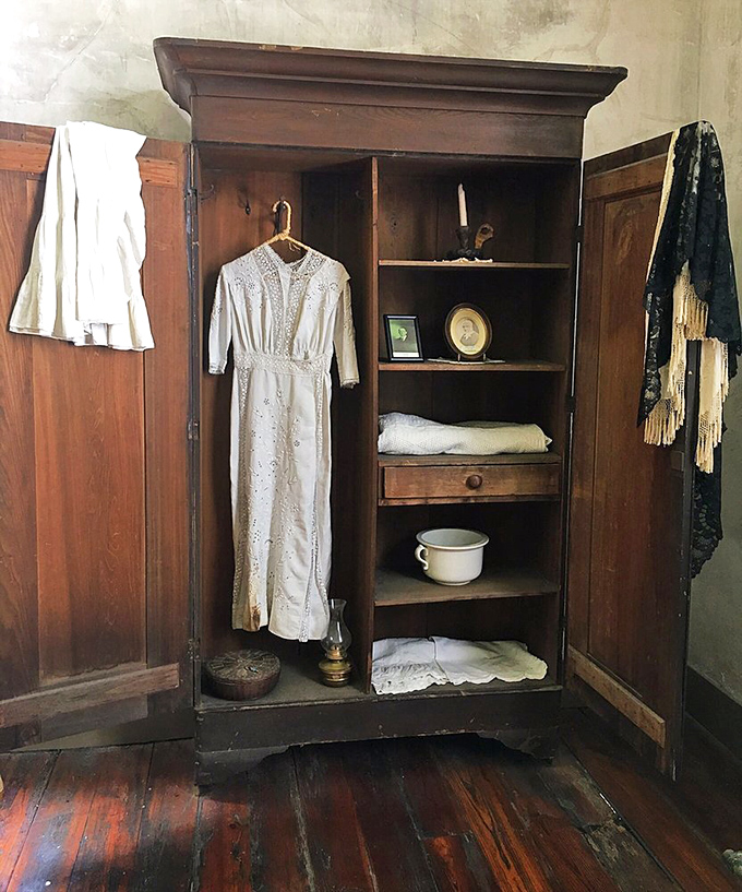 The 19th-century version of a walk-in closet, this wardrobe held the fashions of the day alongside personal treasures.