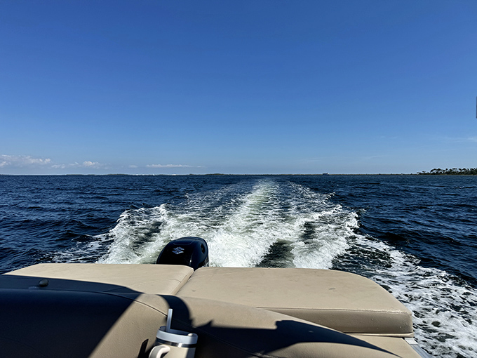 Leaving a wake in crystal waters &ndash; boating around Shell Island offers constantly changing perspectives of this natural gem from every angle.