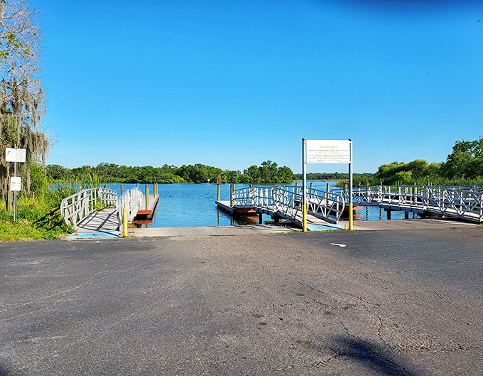 A boat ramp offers easy lake access for fishing enthusiasts and weekend captains, where Florida's aquatic playground beckons with endless possibilities.