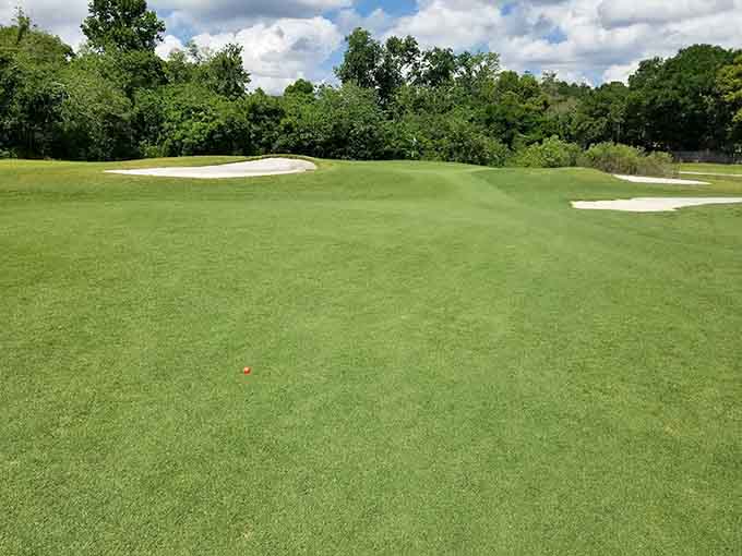 Perfectly manicured fairways stretch toward the horizon, inviting you to test your skills against a course that's challenging yet forgiving.