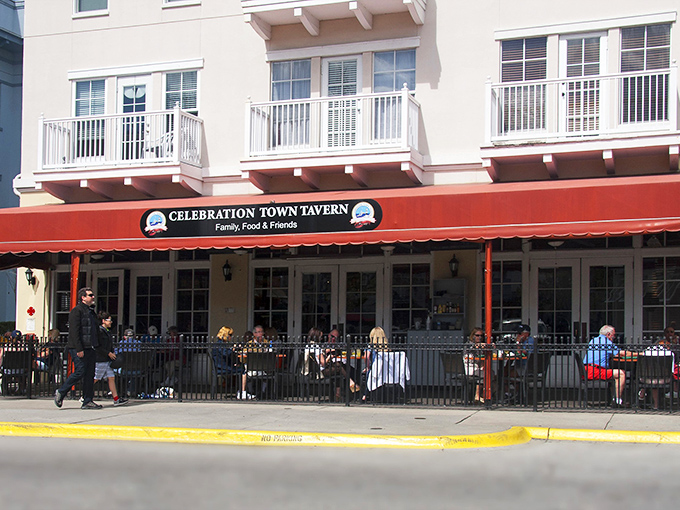 Celebration Town Tavern's inviting patio beckons passersby with promises of cold drinks and warm conversations under Florida skies.