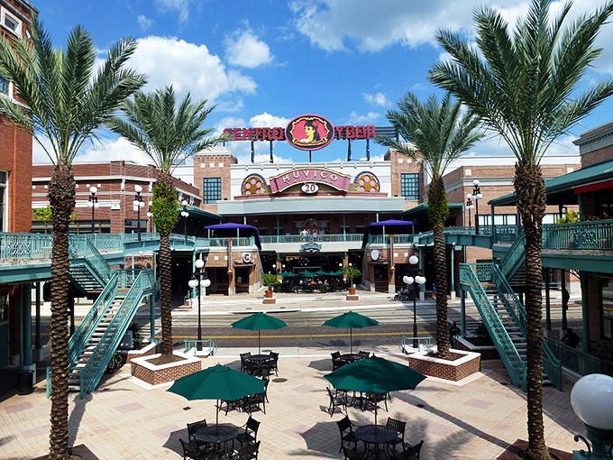 Centro Ybor's open-air plaza invites visitors to linger over coffee or cocktails, its palm trees and Spanish-inspired architecture creating a Mediterranean vibe.