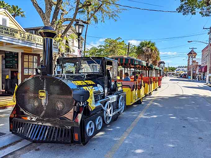 The engineer prepares for departure, ready to transport another group of travelers through Key West's storied past.