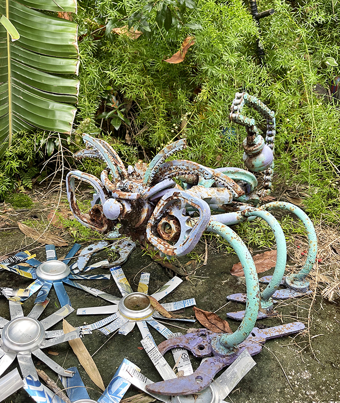 This scrap metal crab looks ready to scuttle between garden beds &ndash; proof that yesterday's junk is today's whimsical garden guardian.