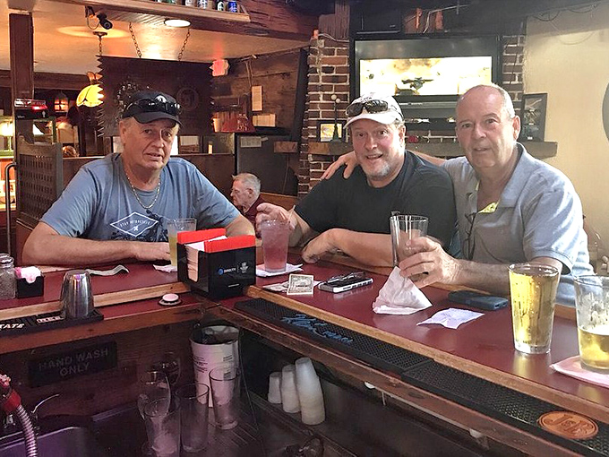 The bar at Ashley's feels like it belongs in a film noir, where regulars share stories over drinks and occasionally glance over their shoulders.