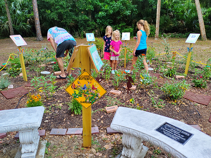 The Children's Butterfly Garden transforms curious kids into budding naturalists, with educational signs guiding their exploration of native plants.