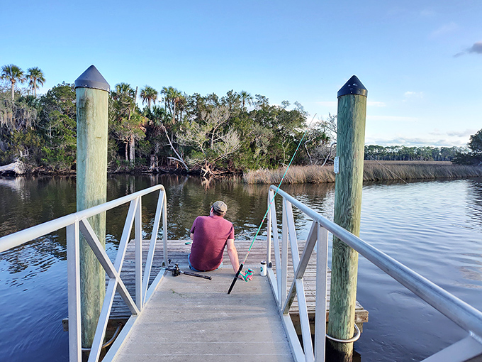 Patient pursuit: A lone angler demonstrates that fishing is less about catching and more about the peaceful waiting.