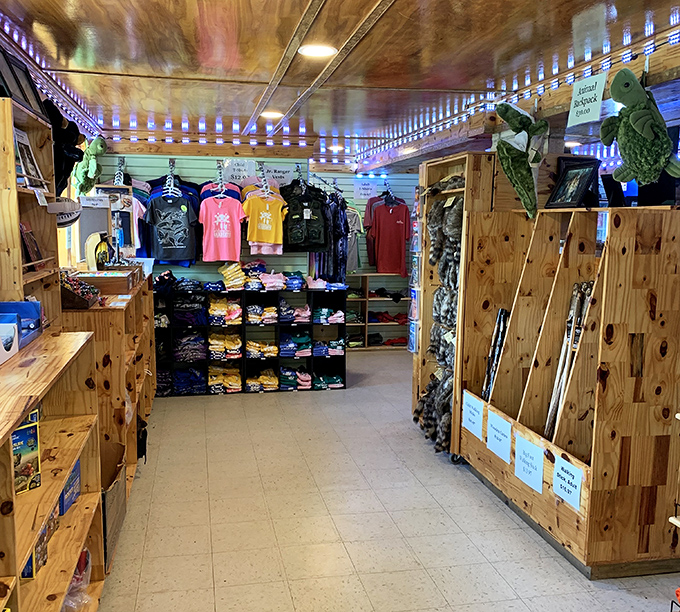 The gift shop's wooden interior houses treasures for cave enthusiasts, from educational books to "I survived the caves" t-shirts.